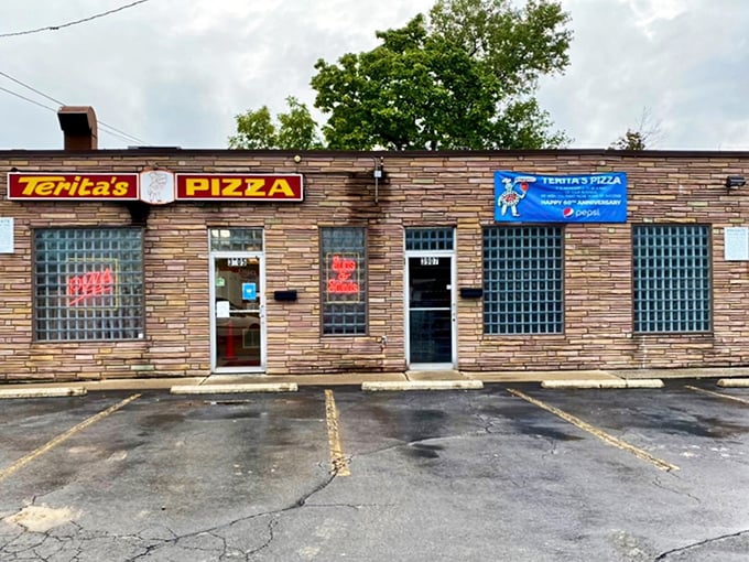 The unassuming brick exterior of Terita's Pizza proves once again that the best food often hides behind the most modest facades.