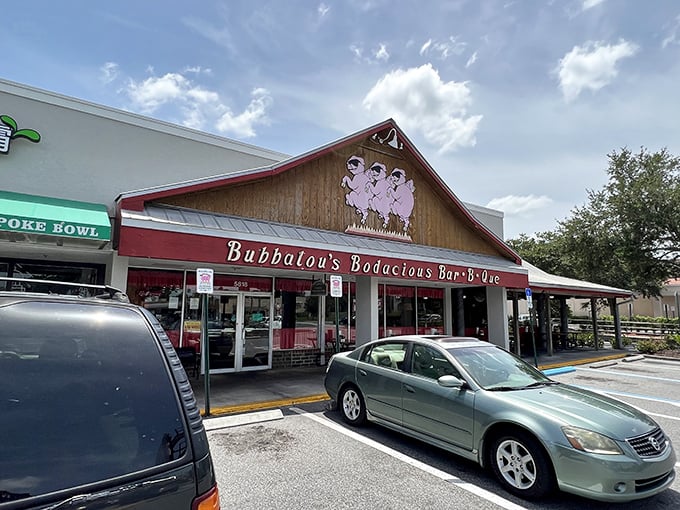 The three dancing pigs on Bubbalou's facade aren't just a logo—they're a promise of the smoky paradise awaiting inside this Orlando BBQ institution.