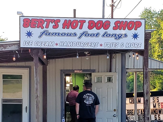 The iconic red and blue sign beckons like a lighthouse for hungry travelers. Bert's promises not just hot dogs, but an authentic slice of Pennsylvania food culture.