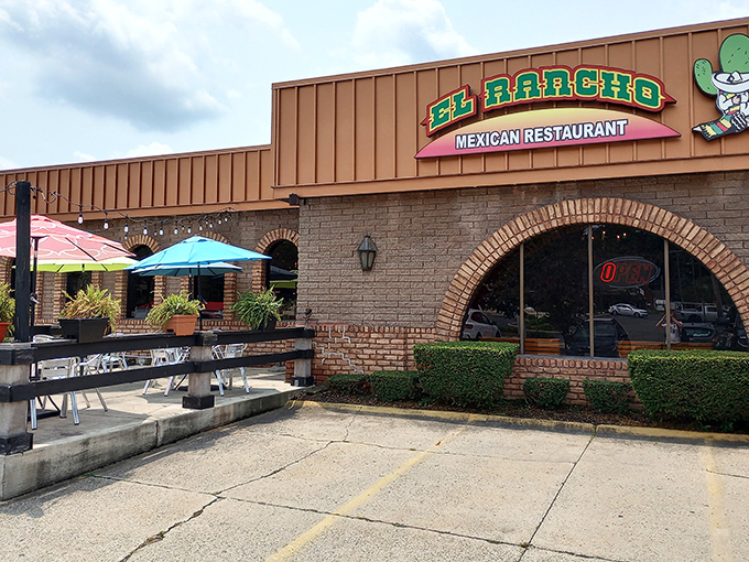 The warm brick exterior of Los Cabos welcomes hungry travelers with colorful umbrellas and lush greenery—a little slice of Mexican sunshine in Akron.