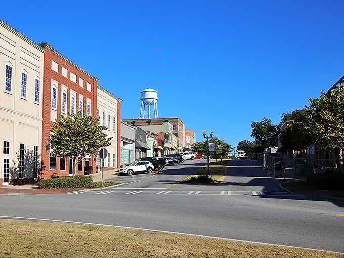 Main Street perfection unfolds where classic red brick buildings create America's most photogenic downtown corridor.