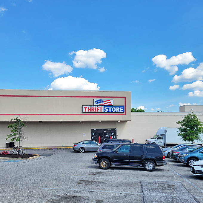 The unassuming exterior of Red White & Blue Thrift Store – like a humble librarian who secretly knows how to wrestle alligators.