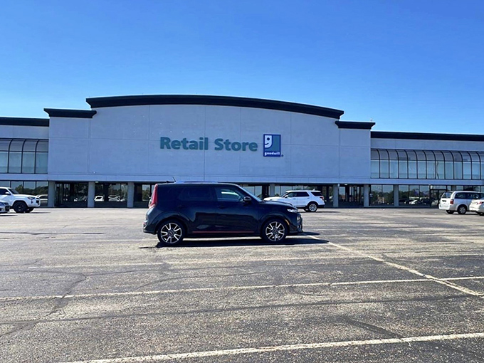 The unassuming exterior belies the treasure trove within. Like a retail speakeasy, this Goodwill's plain façade keeps the bargain-hunting masses at bay.