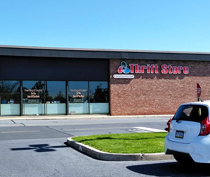 The unassuming brick exterior of CommunityAid in Lancaster hides a treasure trove within—like finding out your quiet neighbor secretly collects vintage Ferraris.