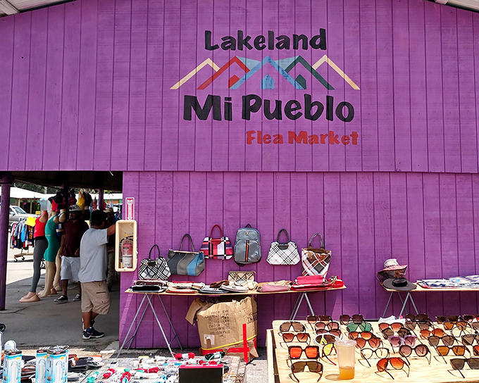 The unmistakable purple facade of Mi Pueblo stands out like a flamingo at a penguin convention, beckoning bargain hunters with its vibrant promise of treasures within.