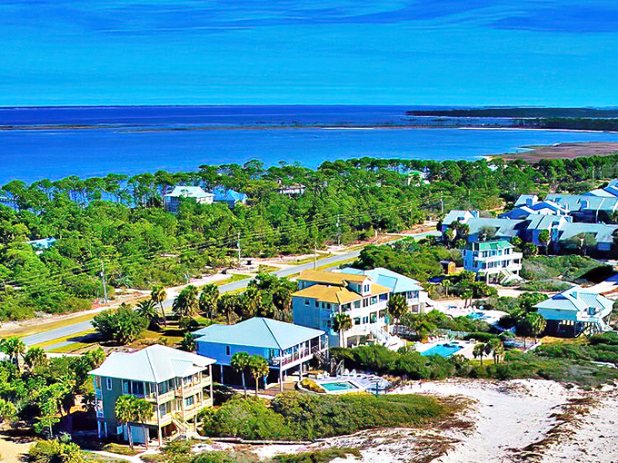 The Cape St. George Lighthouse stands sentinel over sugar-white beaches, a postcard-perfect reminder that some Florida treasures remain blissfully uncommercialized.
