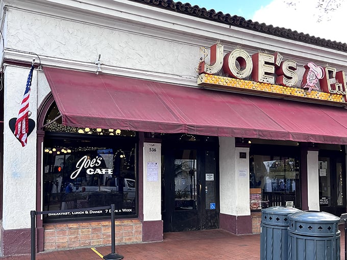 That iconic red awning and vintage signage aren't just decoration—they're a promise of the timeless comfort waiting inside Joe's Café on State Street.