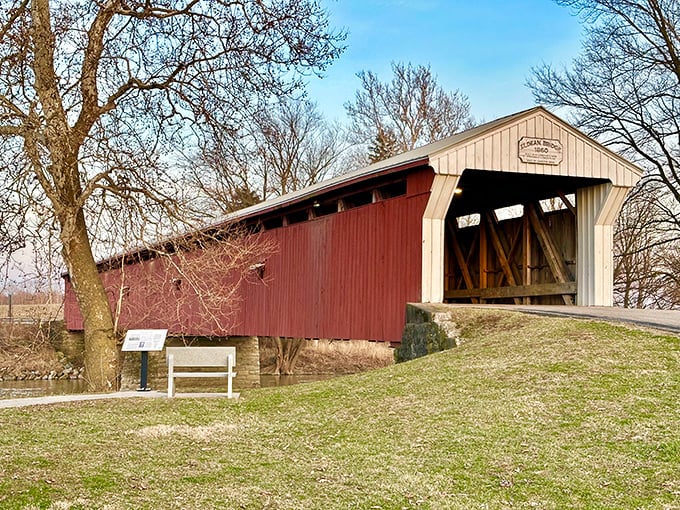 The classic red siding and white-trimmed portals of the Eldean Bridge create that perfect "you've arrived somewhere special" moment as you approach this 1860 treasure.
