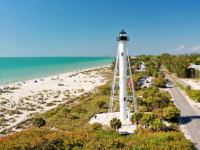 The ultimate Florida flex – a pristine white lighthouse standing sentinel over turquoise waters and powdery beaches. Maritime elegance meets paradise.