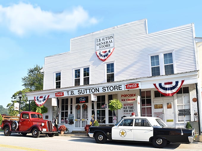 The T.B. Sutton General Store stands as a time capsule with its vintage vehicles parked out front – nostalgia you can actually touch and taste.
