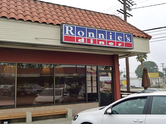 The Spanish-tiled roof and classic signage of Ronnie's Diner beckons like an old friend promising comfort in pancake form.