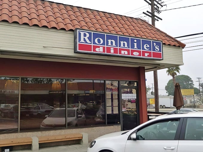 The Spanish-tiled roof and classic signage of Ronnie's Diner beckons like an old friend promising comfort in pancake form.