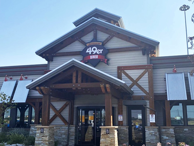 The 49er Diner's rustic exterior welcomes hungry travelers like a Gold Rush-era prospector who struck culinary gold instead of the mineral kind.
