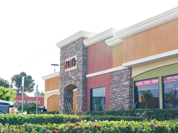 The stone facade of J & M's welcomes hungry travelers like a culinary lighthouse in Escondido's commercial landscape. No pretension, just the promise of good eating ahead.