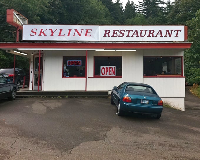 The "Skyline Car Service" sign might confuse your GPS, but your taste buds will thank you for finding this Portland burger sanctuary.