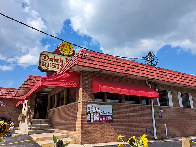 The iconic red-roofed Dutch Kitchen stands like a time capsule along Route 61, promising comfort food that predates food influencers and their ring lights.