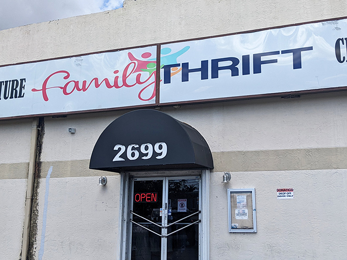 The unassuming exterior of Family Thrift Store in Lauderdale Lakes – where treasure hunting begins beneath Florida's sunny skies.