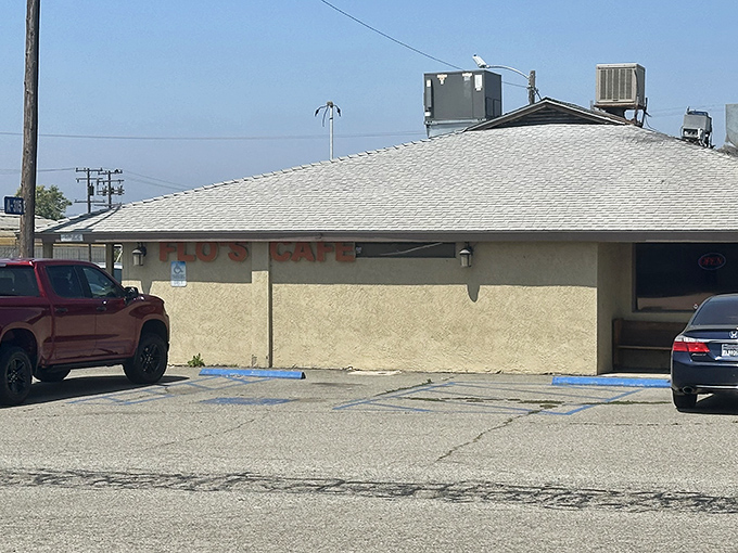 The unassuming exterior of Flo's Airport Cafe promises "Country Cookin' at its Best" – a claim that proves deliciously accurate once you step inside.