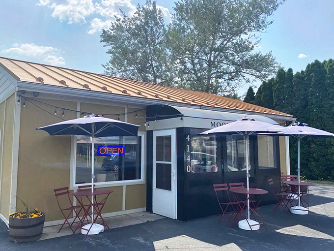 The unassuming exterior of Moonlight Café might fool you, but that neon "OPEN" sign is actually a portal to pasta paradise.
