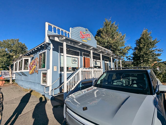 The little blue cabin with the red "Stove" sign isn't trying to be Instagram-famous—it's too busy serving breakfast that'll make you forget your own name.