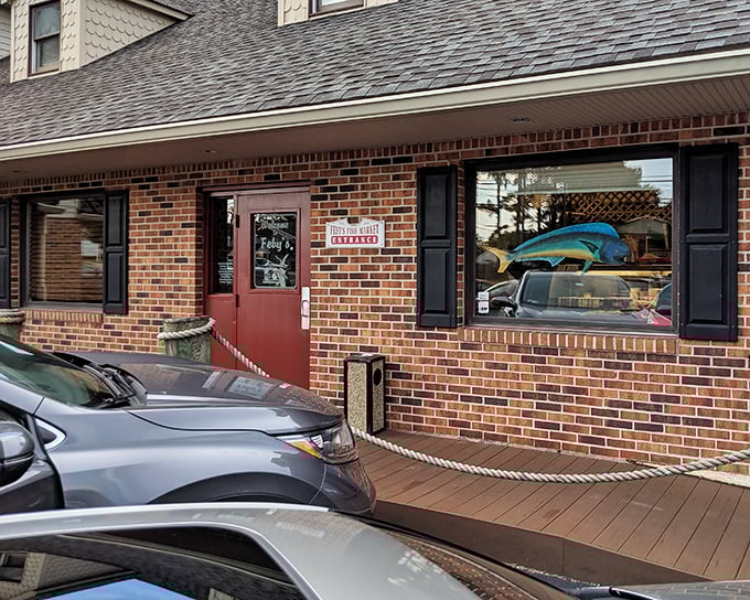 The brick facade promises seafood excellence, and those windows practically wink at passing food lovers.
