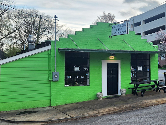 That brilliant green paint job isn't trying to hide – it's announcing something extraordinary awaits inside.