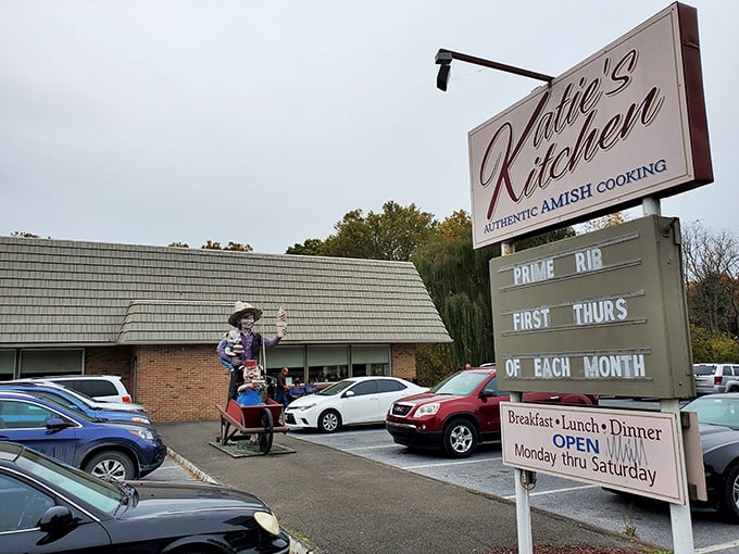 The whimsical statue outside Katie's Kitchen stands like a culinary guardian, promising homestyle delights within. First impressions matter, and this one's delightfully quirky.
