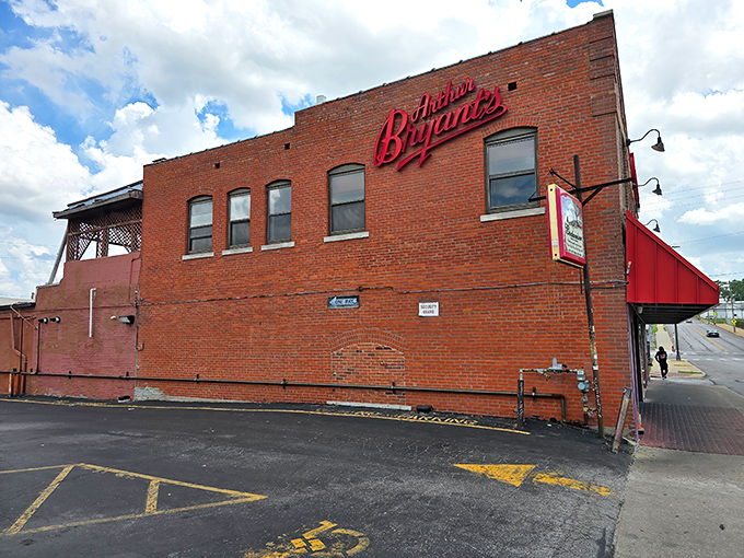 That iconic red sign against brick has been beckoning barbecue pilgrims for decades. Some landmarks need no introduction—this is BBQ royalty.