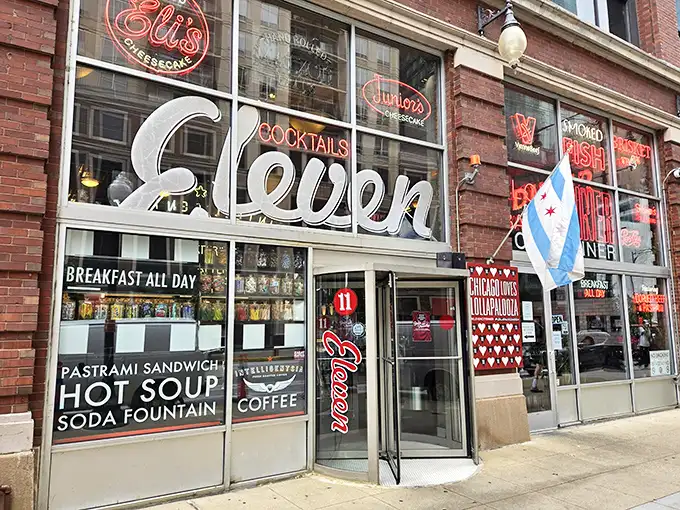 The neon promise of "Eleven" glows like a beacon for the hungry. Chicago's flag flutters proudly alongside promises of breakfast, pastrami, and soda fountain delights.