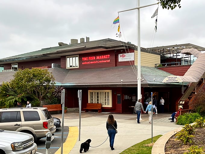 The Fish Market's nautical exterior stands like a welcoming lighthouse for hungry seafood pilgrims. Those flags aren't just for show—they're signaling "fresh catch ahead!"
