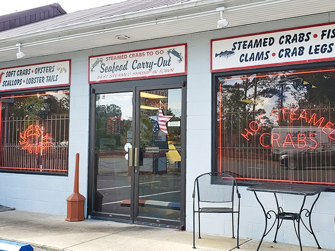 The seafood siren call of Crisfield! Those neon crab signs aren't just decoration—they're beacons guiding hungry Marylanders to their happy place.