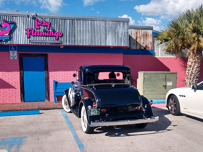 The pink fence and cartoon flamingo aren't just decoration—they're a promise of the unpretentious island joy waiting inside this Sanibel treasure.