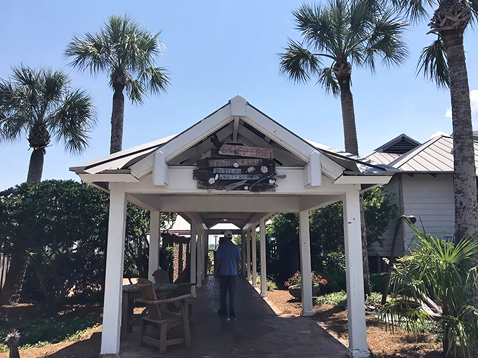 Waterfront dining at its most authentic—weathered wooden decks, Adirondack chairs, and a coastal breeze that seasons every bite better than salt.