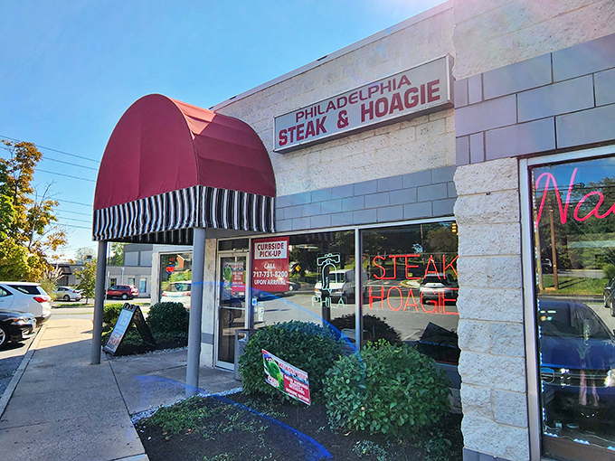 That iconic red awning isn't just eye-catching—it's a beacon calling sandwich lovers home to this unassuming strip mall treasure.