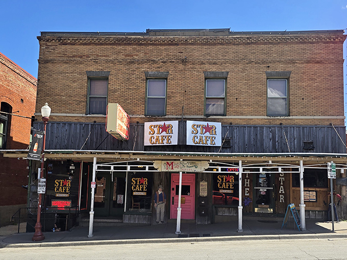 The Star Cafe's brick exterior stands as a time capsule on Fort Worth's Exchange Avenue, where hungry cowboys and curious tourists have been finding common ground for generations.