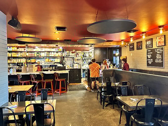 The unassuming exterior of Pig Floyd's hides a flavor revolution within. Modern wooden accents and that bold sign promise barbecue with attitude.