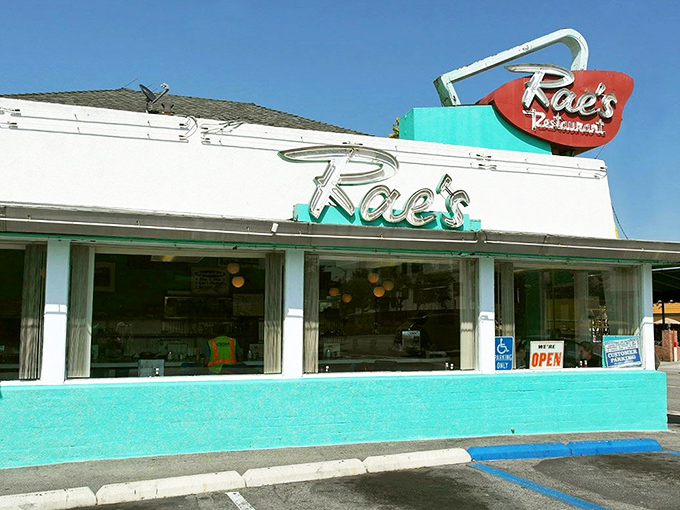 That iconic turquoise exterior isn't just a building—it's a time machine to when diners were the cornerstone of American social life.
