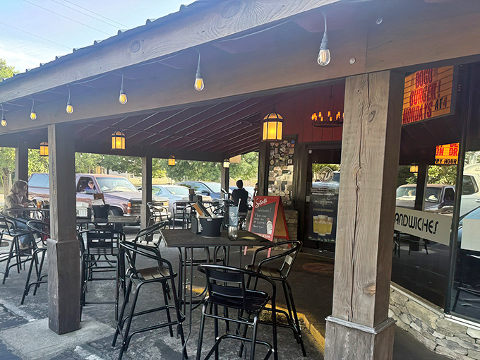 The bright red exterior of Burger Tavern 77 stands out like a beacon for burger enthusiasts, promising gourmet comfort in Columbia's Devine Street district.