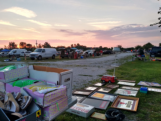 Sunset shopping at its finest – vendors set up their treasures against a cotton candy sky as early birds hunt for tomorrow's heirlooms.
