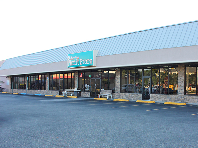 The iconic turquoise sign glows like a beacon for bargain hunters as dusk settles over Tampa. Treasure awaits behind those glass doors!