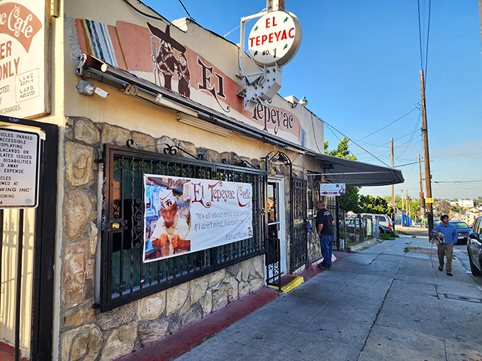 The unassuming exterior of El Tepeyac Cafe stands like a culinary lighthouse in Boyle Heights, promising giant burritos to those brave enough to enter.