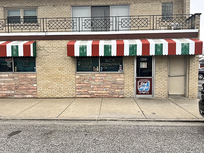 The Italian flag-inspired awning isn't just decoration—it's a beacon of pizza promise on Chicago's South Side since 1932.