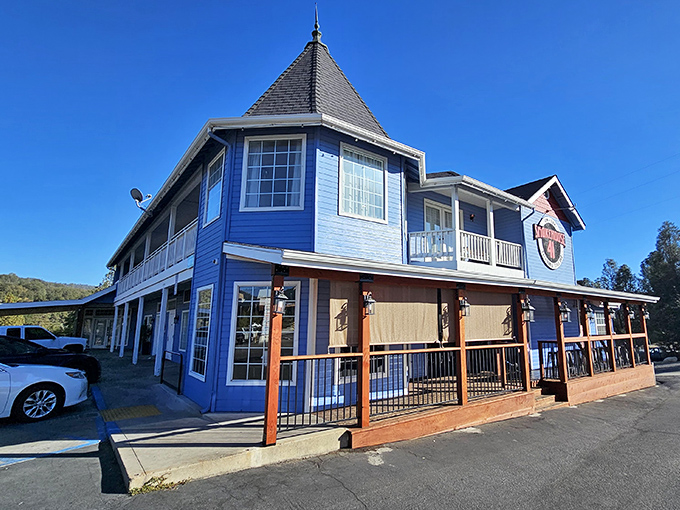 The blue beacon of barbecue bliss! Smokehouse 41's distinctive exterior promises smoky treasures within, like a delicious mirage in the Sierra foothills.