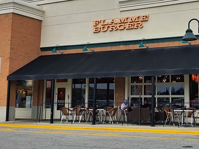 The unassuming storefront of Flamme Burger hides culinary treasures within, like finding a secret level in your favorite video game.