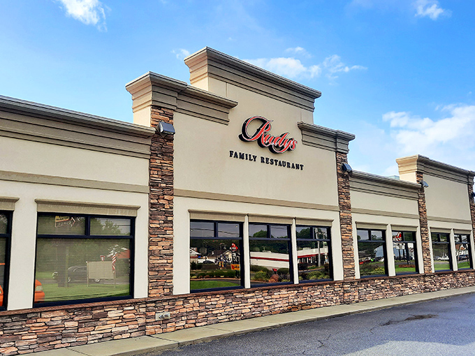 Rudy's stone-accented exterior doesn't need flashy gimmicks – like a perfectly seasoned steak, it lets quality speak for itself. 