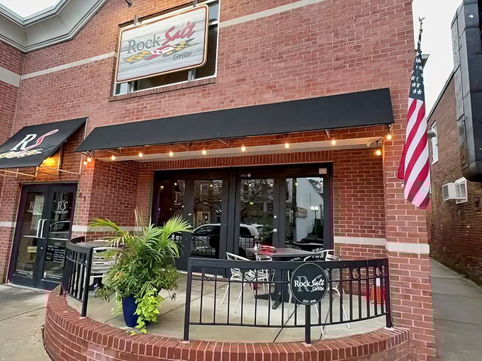 The brick façade and modest black awning of RockSalt Grille hide Westminster's seafood sanctuary like a pearl in an unassuming oyster.