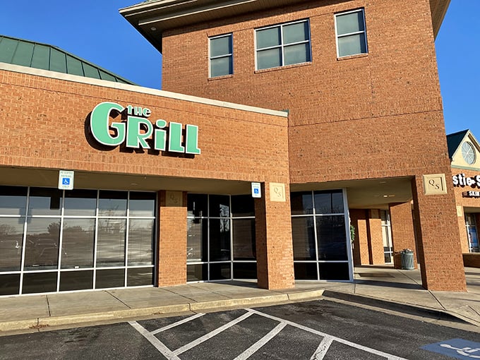 The brick exterior with its bold green sign promises no pretension—just honest food that speaks volumes without needing a fancy facade.