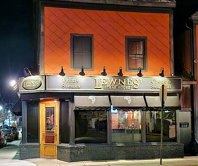 The iconic orange exterior of Lewnes' glows like a beacon for steak lovers, promising old-school charm and serious beef credentials. 