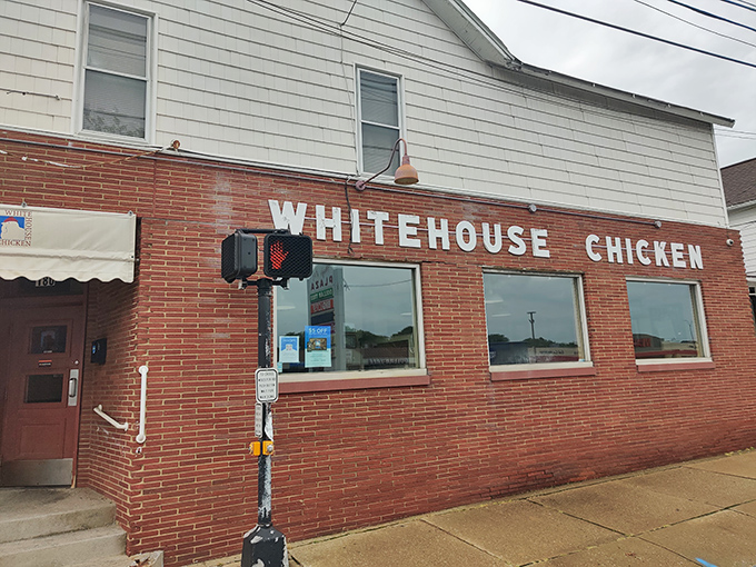 The brick fortress of fried chicken dreams stands ready to welcome hungry pilgrims seeking Barberton's crispy gold.