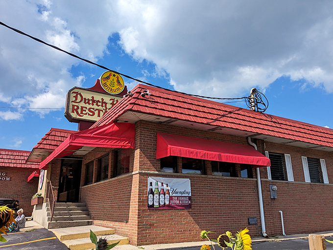 The iconic red-roofed Dutch Kitchen stands like a time capsule along Route 61, promising comfort food that predates food influencers and their ring lights.